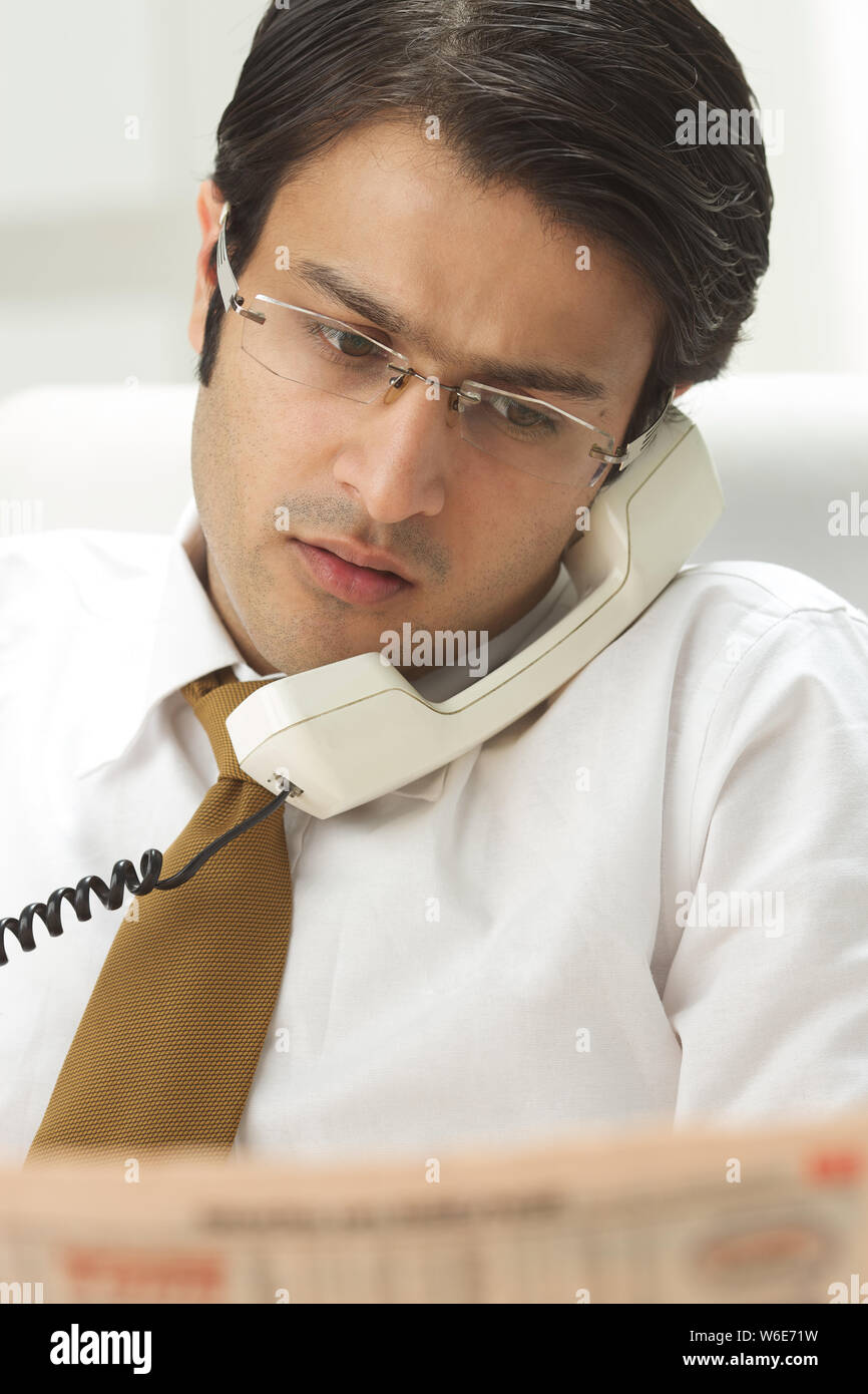 Man landline phone hi-res stock photography and images - Alamy