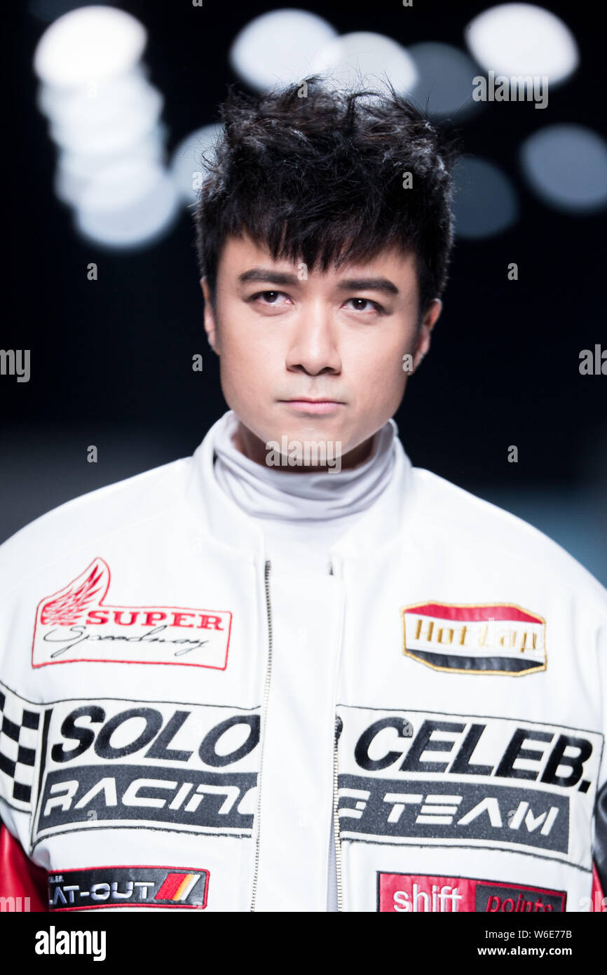 Hong Kong singer, actor and designer Leo Ku displays a new creation at ...
