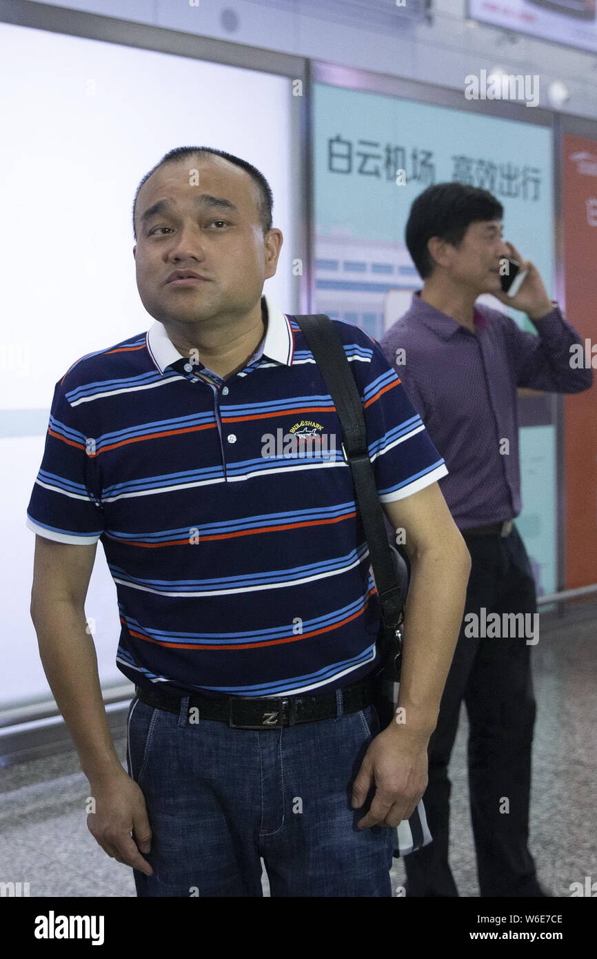 Chinese doctor Tan Qindong who was detained for three months for ...