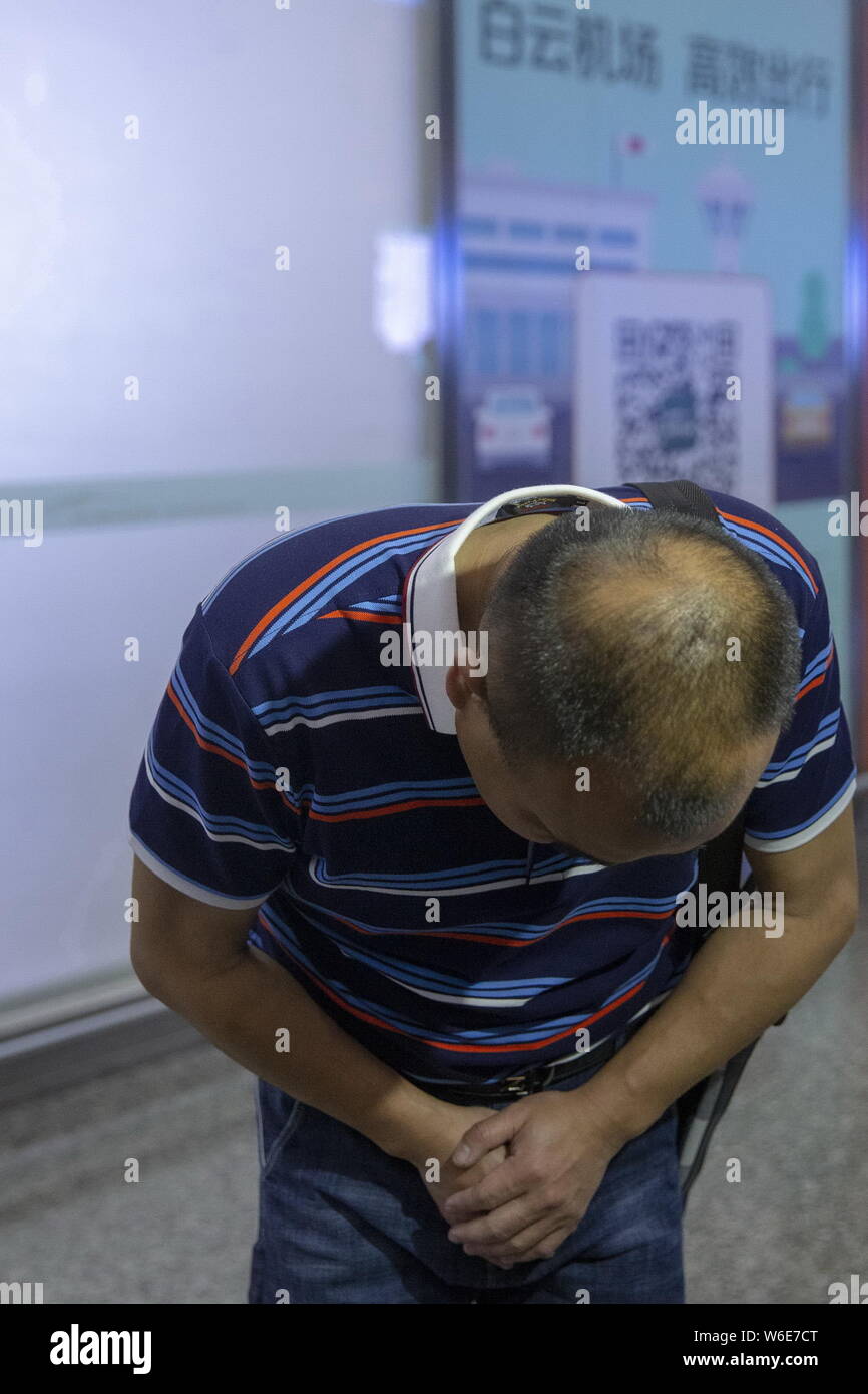 Chinese doctor Tan Qindong who was detained for three months for ...