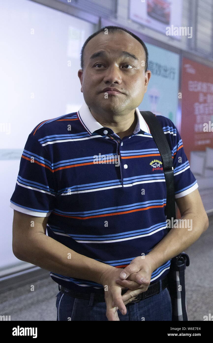 Chinese doctor Tan Qindong who was detained for three months for ...