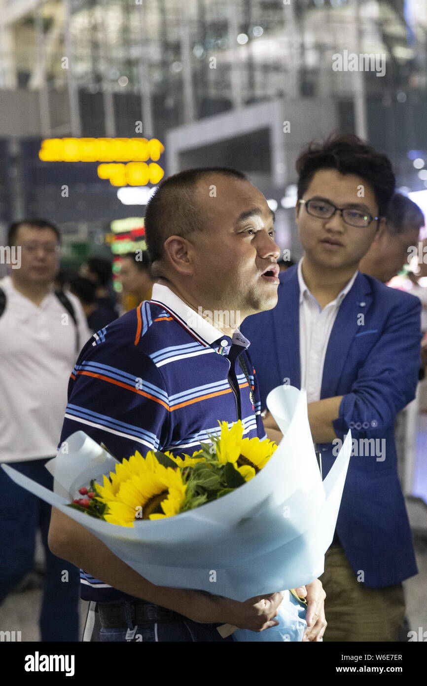 Chinese doctor Tan Qindong who was detained for three months for ...