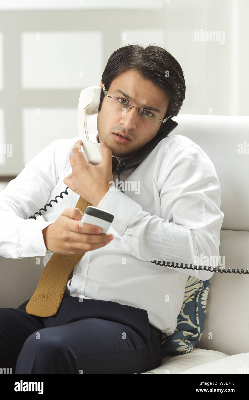 Employee using landline phone call hi-res stock photography and images ...