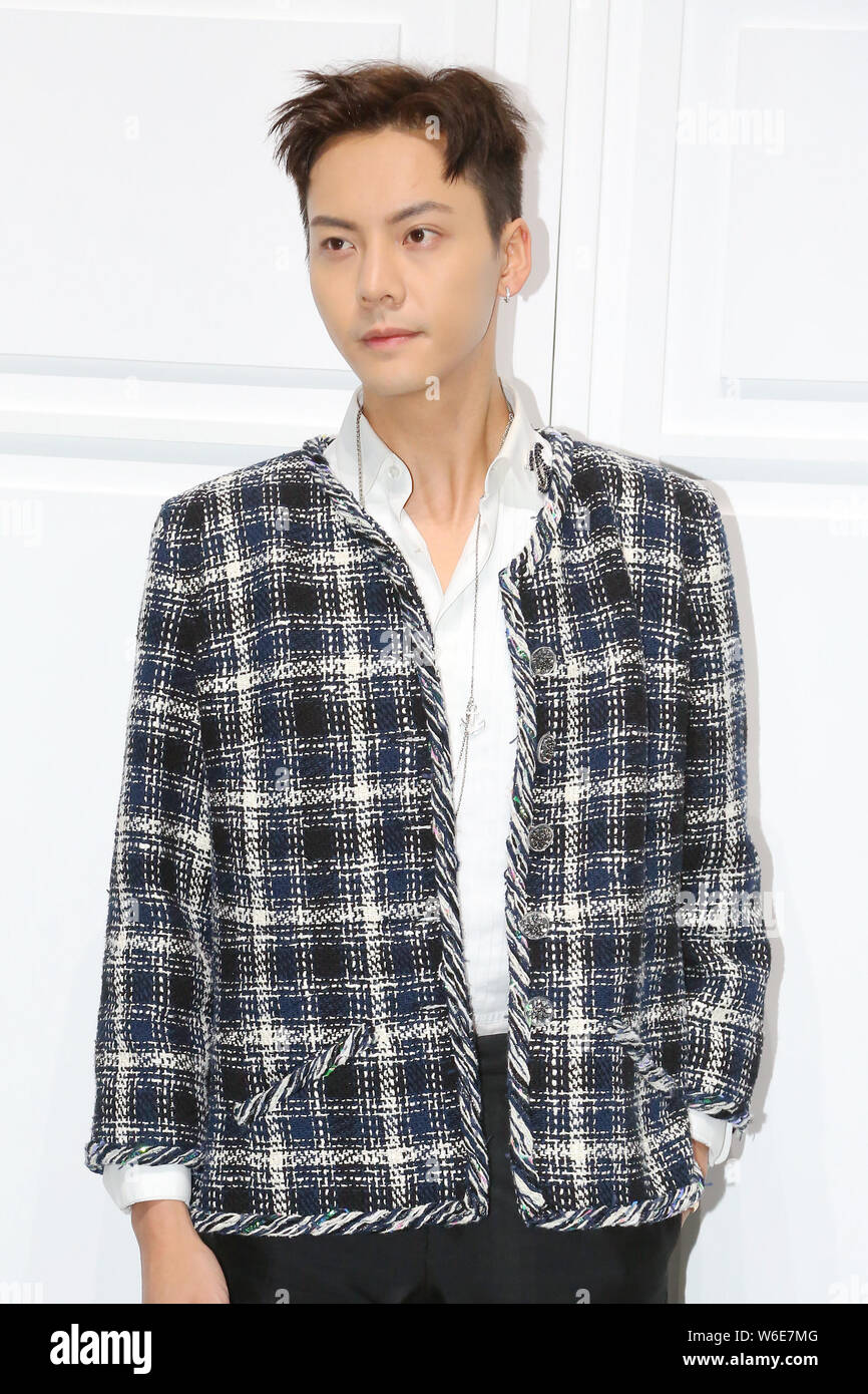 Hong Kong singer and actor William Chan attends a promotional event for ...