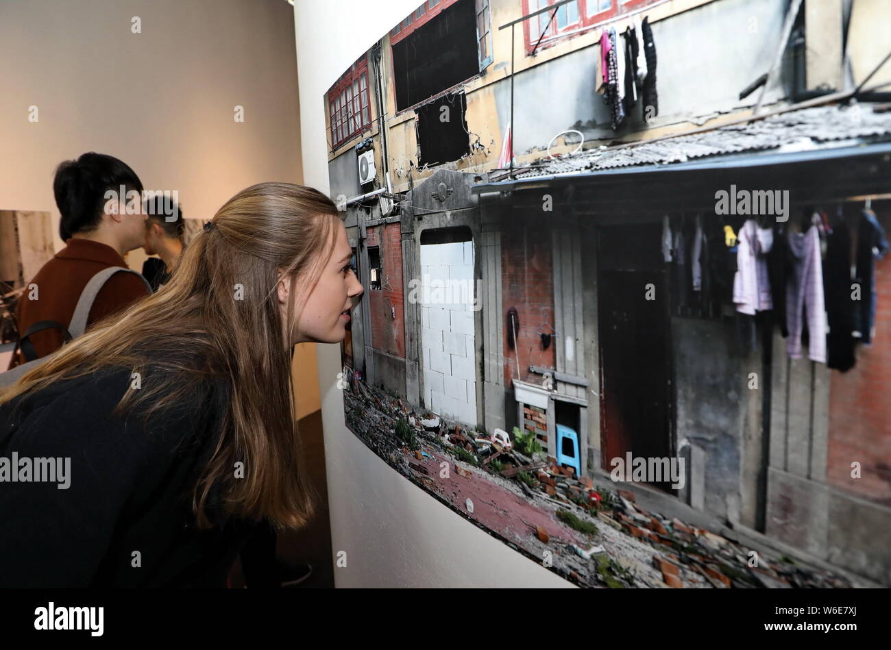 People visit the global debut show of "Like Child's Play" held by ...