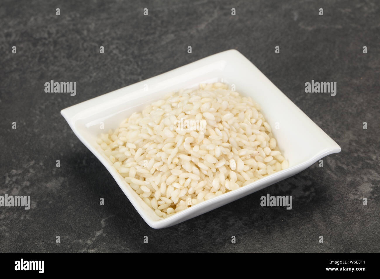 Raw Arborio rice for Italian risotto Stock Photo - Alamy