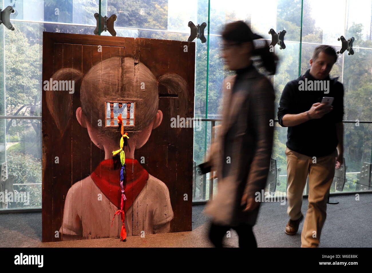 People visit the global debut show of "Like Child's Play" held by ...