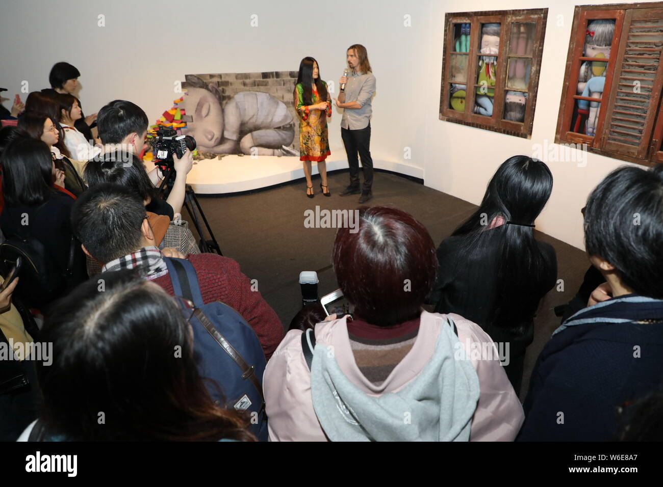 People visit the global debut show of "Like Child's Play" held by ...