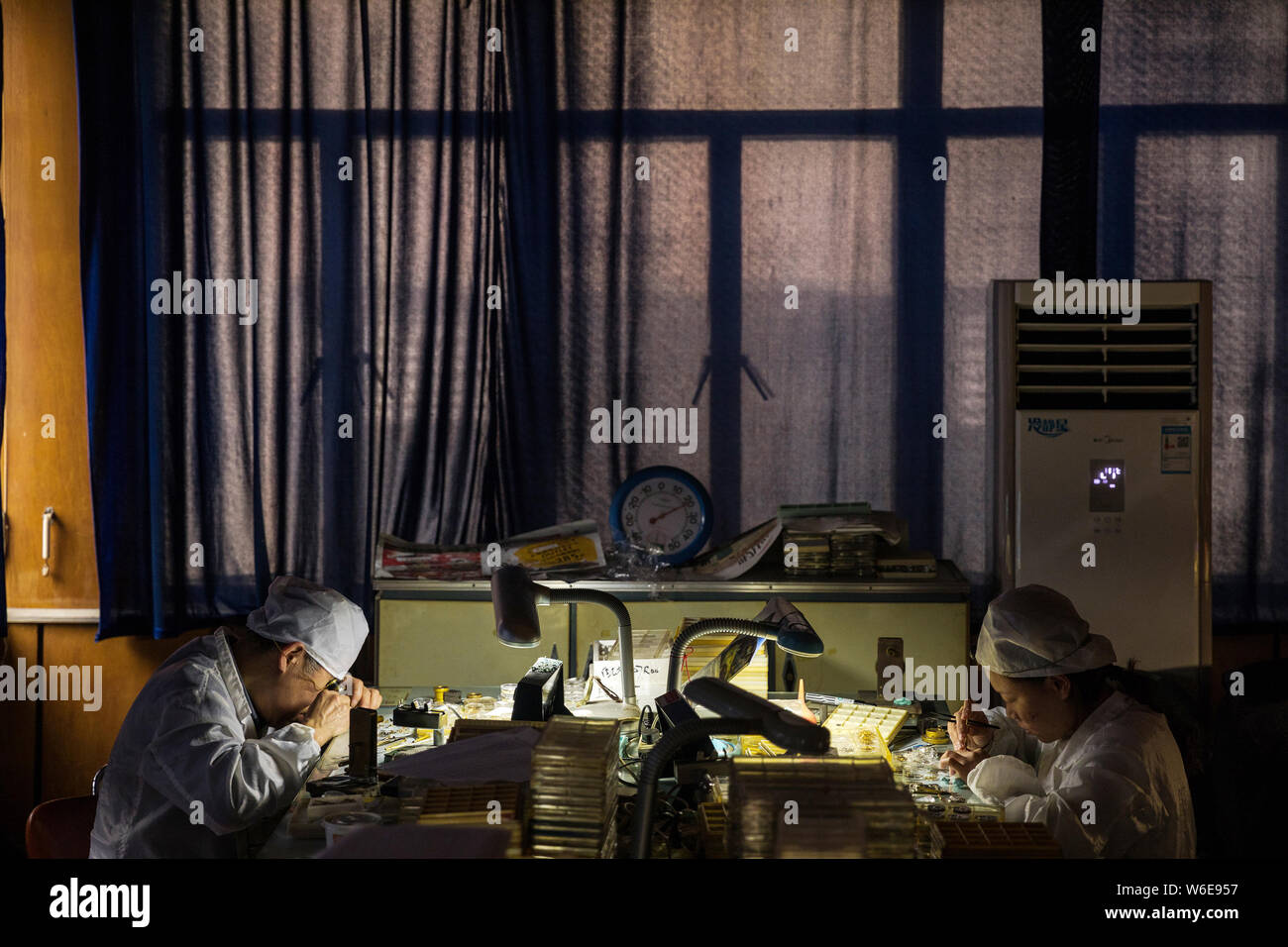 Chinese technicians assemble watches of Chinese watch brand Shanghai ...