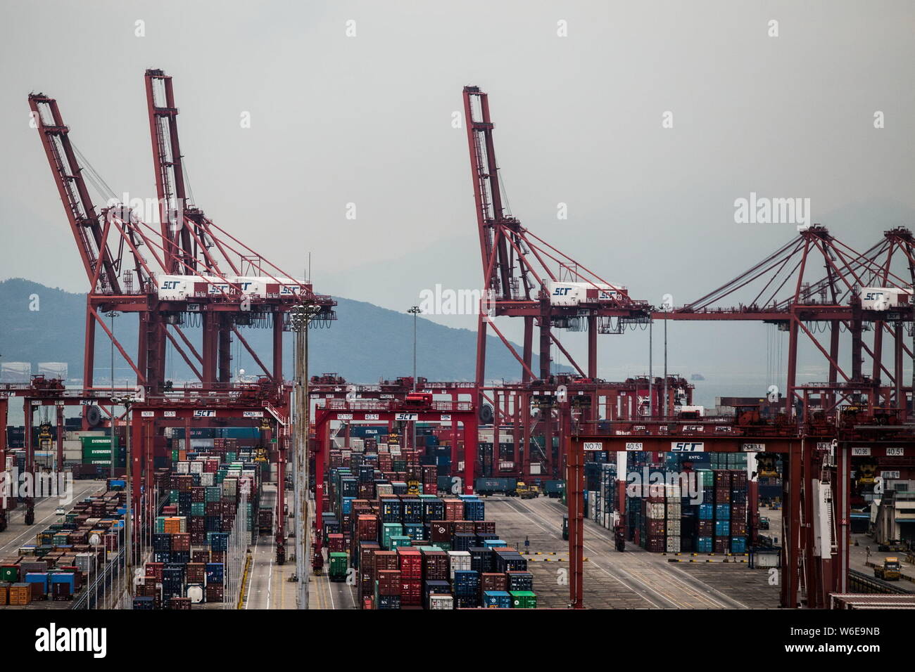 --FILE--Containers are piled up at a container terminal at the Shekou ...