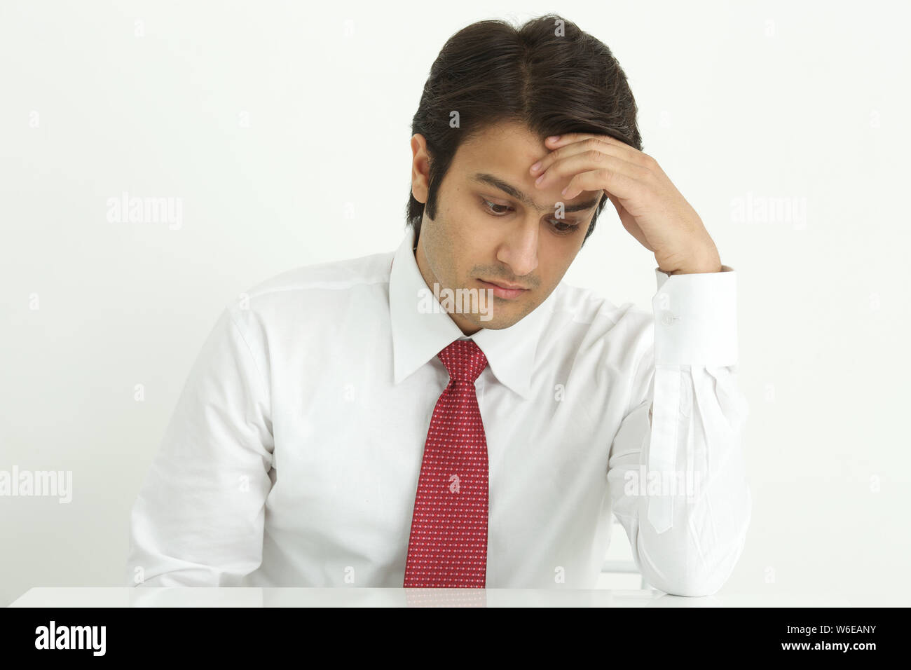 Businessman looking sad Stock Photo - Alamy