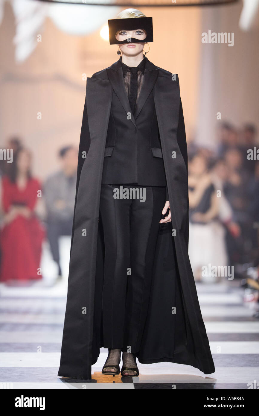 A model displays a new creation during Christian Dior Spring/Summer ...