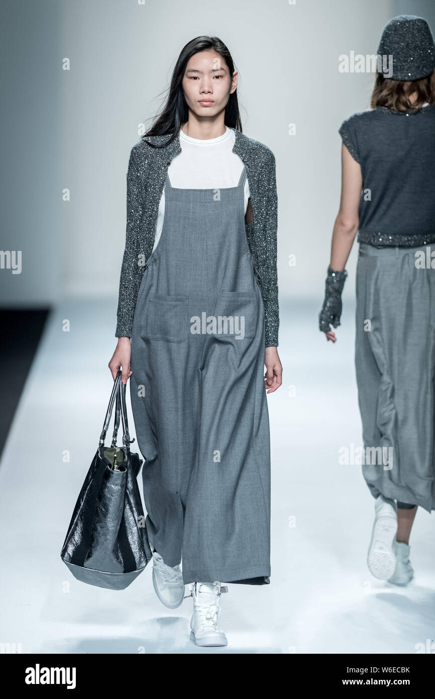 A model displays a new creation at the fashion show of Blancvert during the Shanghai Fashion ...