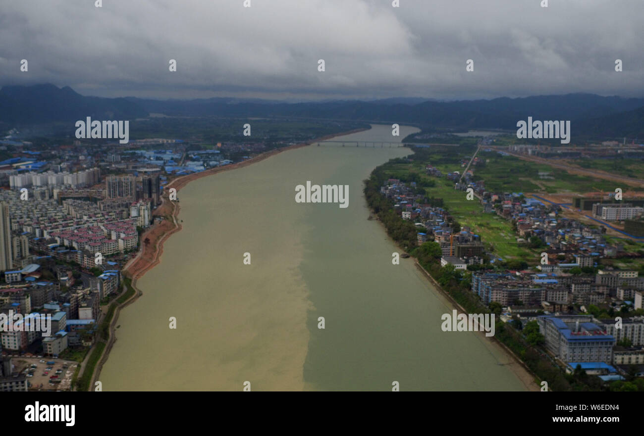 Aerial view of the Rongjiang river divided into two parts after heavy ...