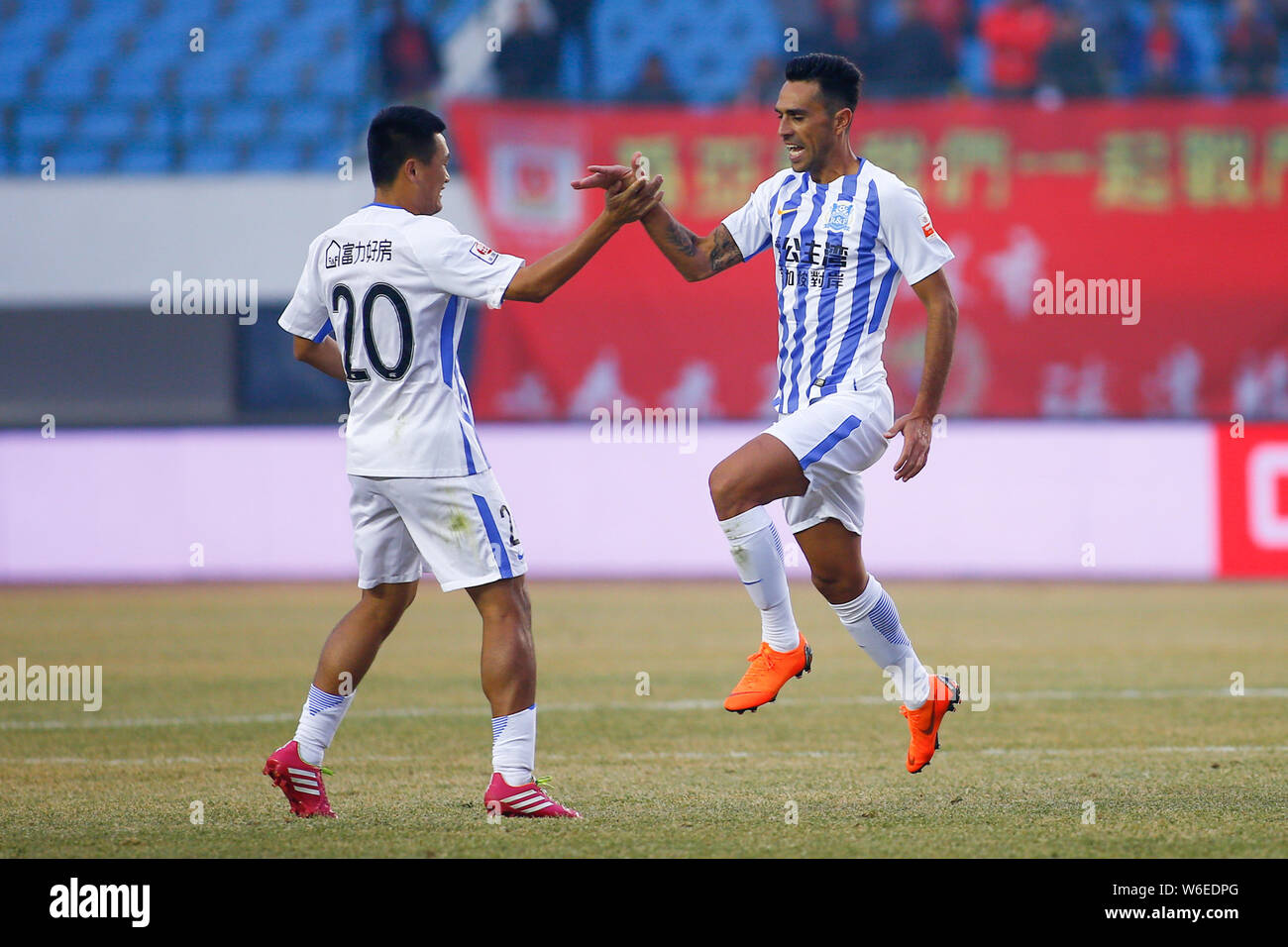 Israeli football player Eran Zahavi of Guangzhou R&F celebrates with ...