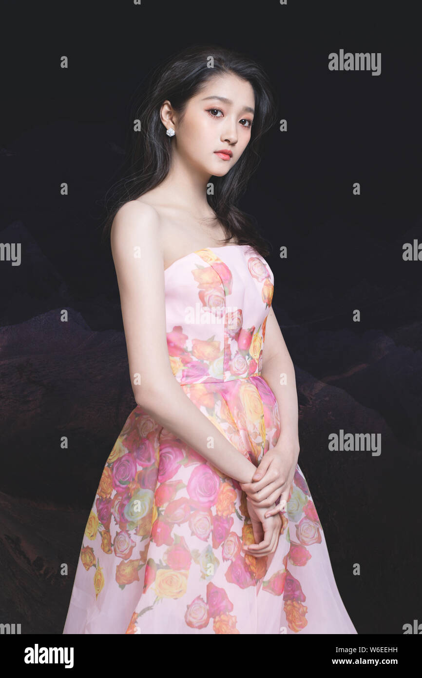 Chinese actress Guan Xiaotong poses for portrait photos during an ...