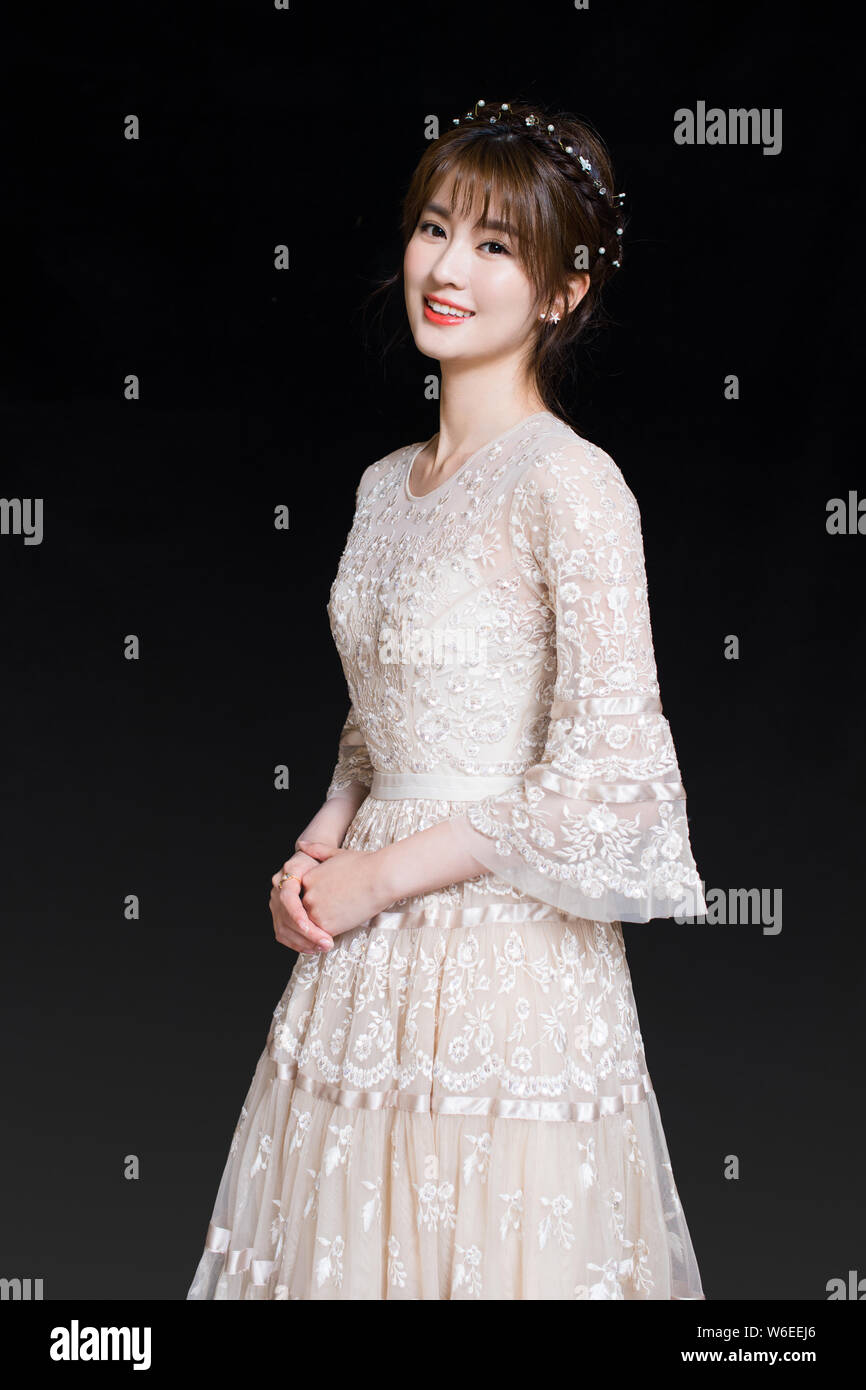 Chinese actress Qiao Xin, also known as Bridgette Qiao, poses for ...