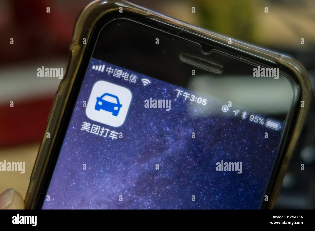 --FILE--View of an icon of the mobile app Meituan Dache, the car ...