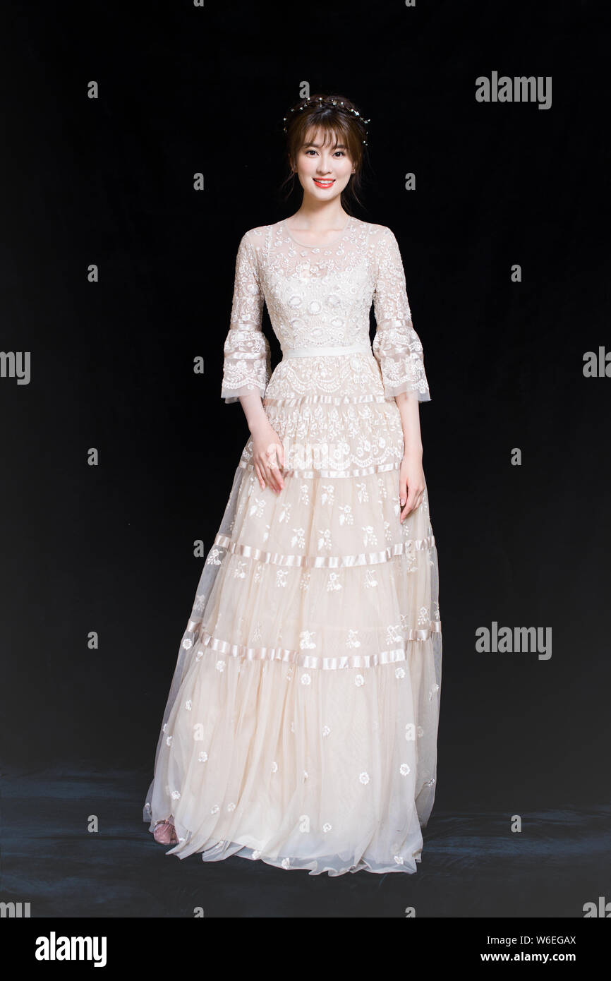 Chinese actress Qiao Xin, also known as Bridgette Qiao, poses for ...