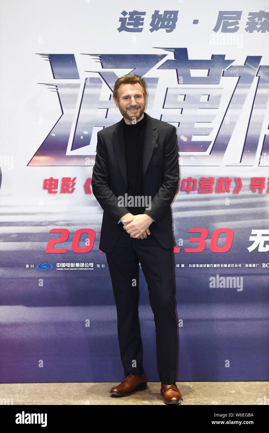 Hollywood actor Liam Neeson poses on the red carpet for a premiere of ...