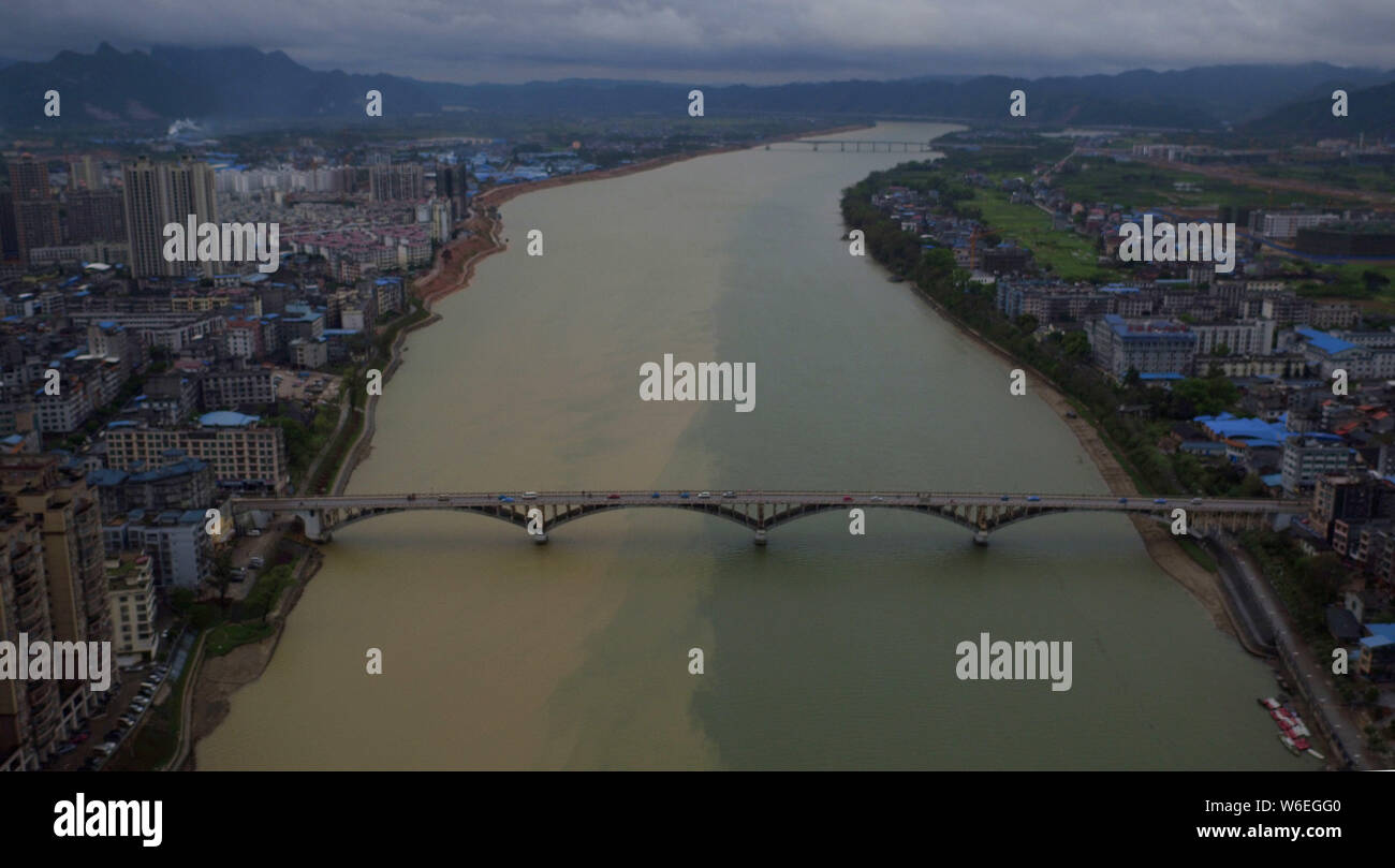 Aerial view of the Rongjiang river divided into two parts after heavy ...
