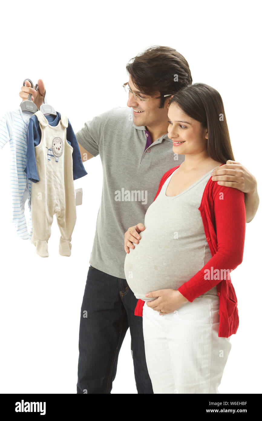 Young man holding abdomen Cut Out Stock Images & Pictures - Alamy