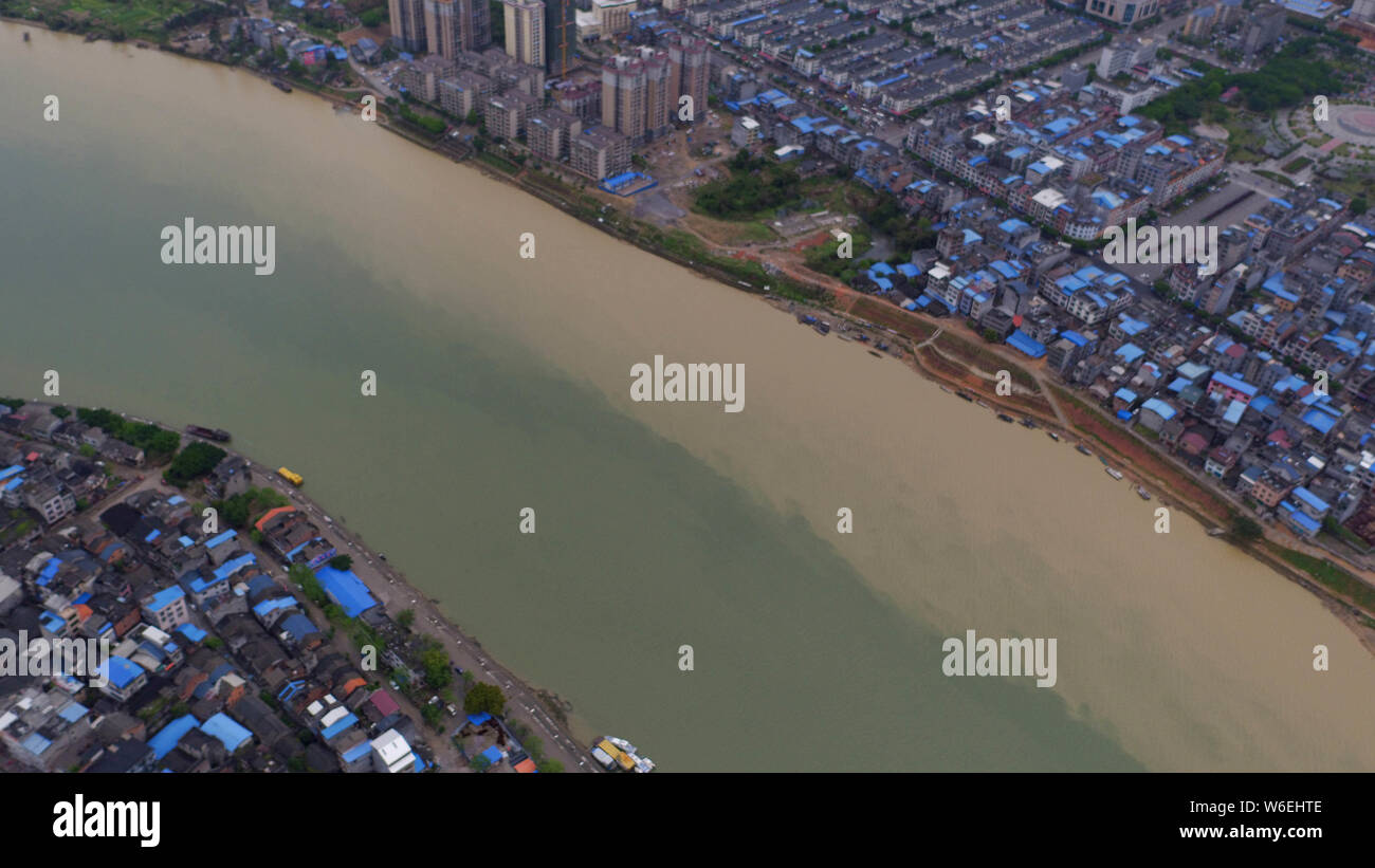 Aerial view of the Rongjiang river divided into two parts after heavy ...
