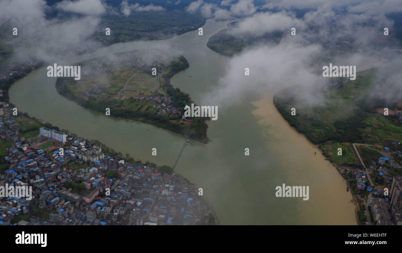 Aerial view of the Rongjiang river divided into two parts after heavy ...
