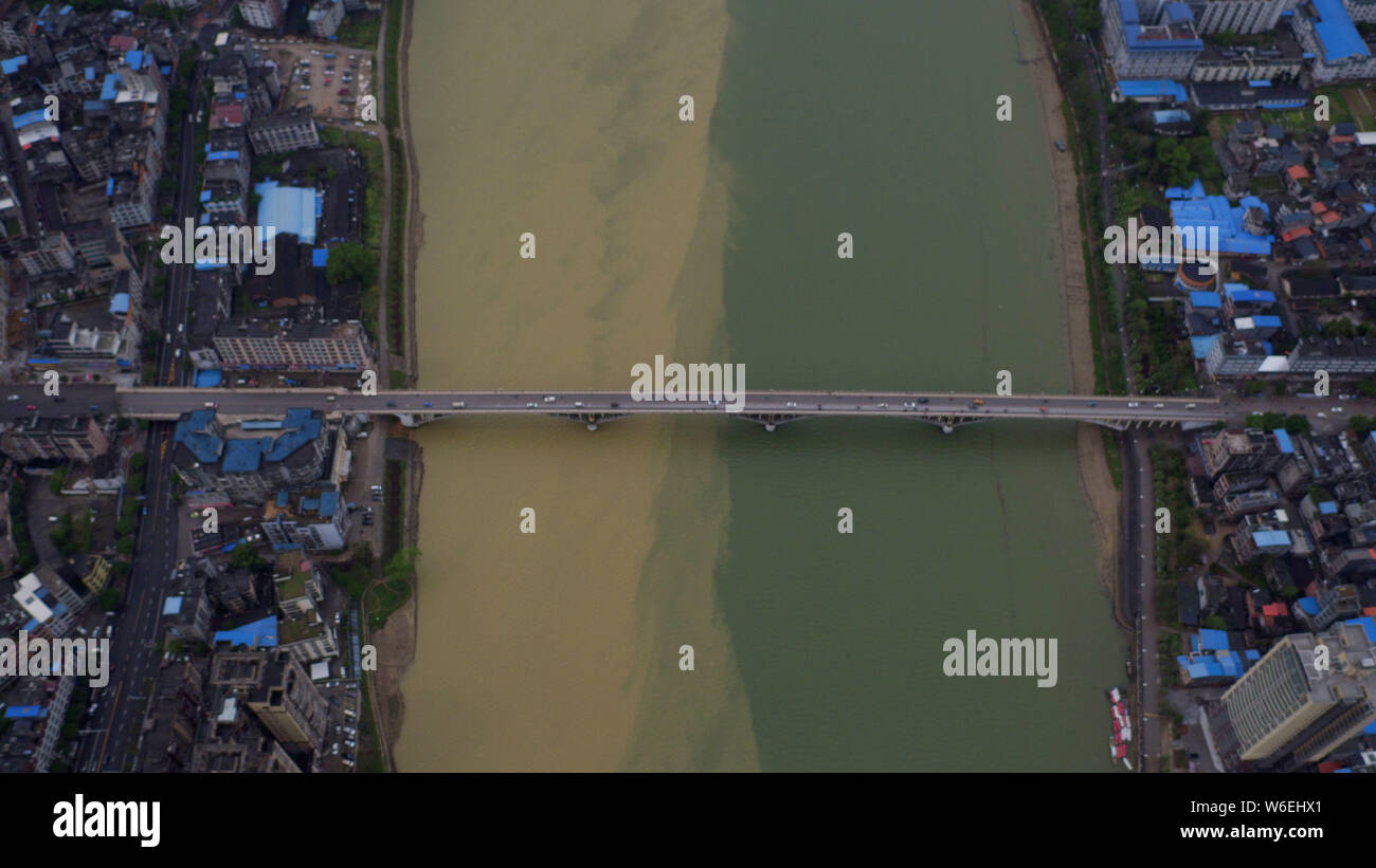 Aerial view of the Rongjiang river divided into two parts after heavy ...