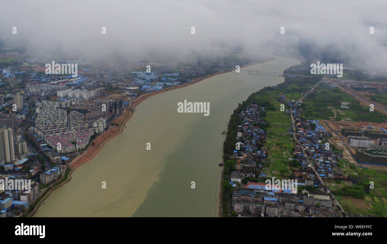 Aerial view of the Rongjiang river divided into two parts after heavy ...
