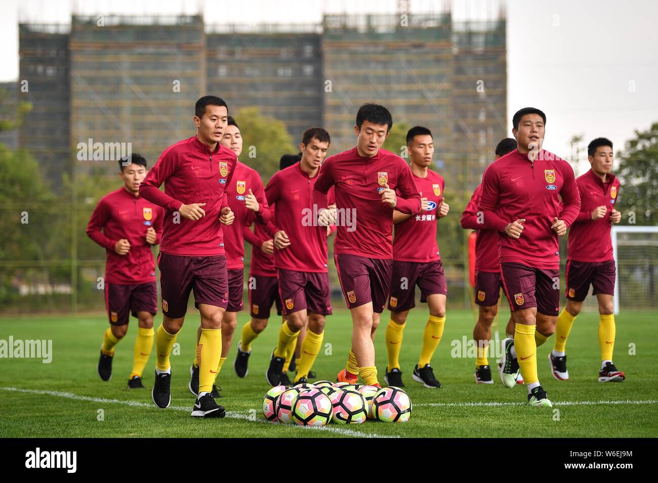 Players of Chinese national men's football team take part in a training ...