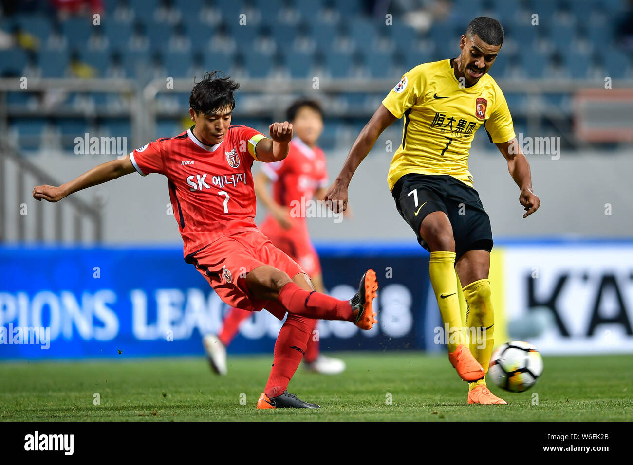 Brazilian football player Alan Carvalho, right, of China's Guangzhou ...