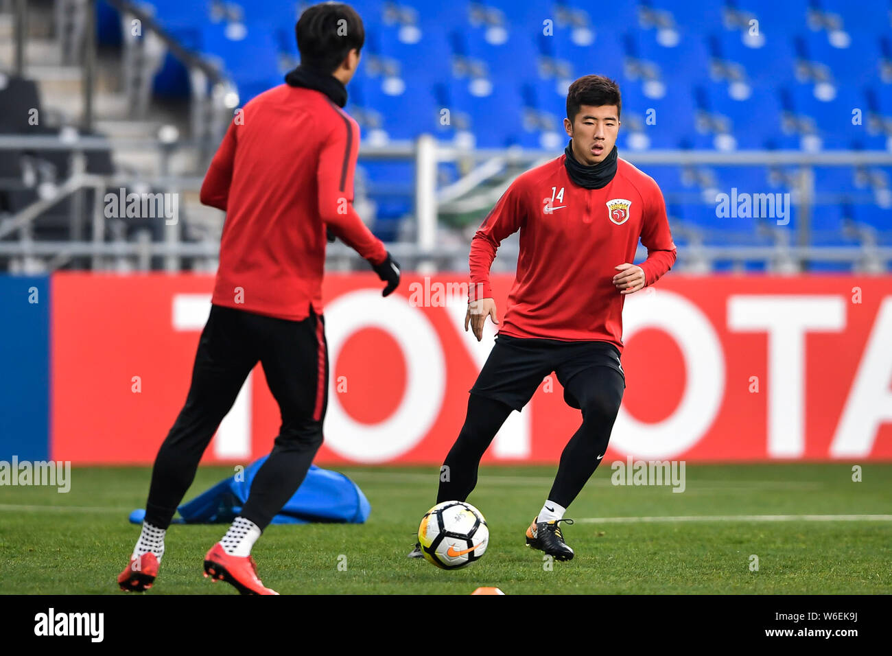 Players of China's Shanghai SIPG FC take part in a training session ...