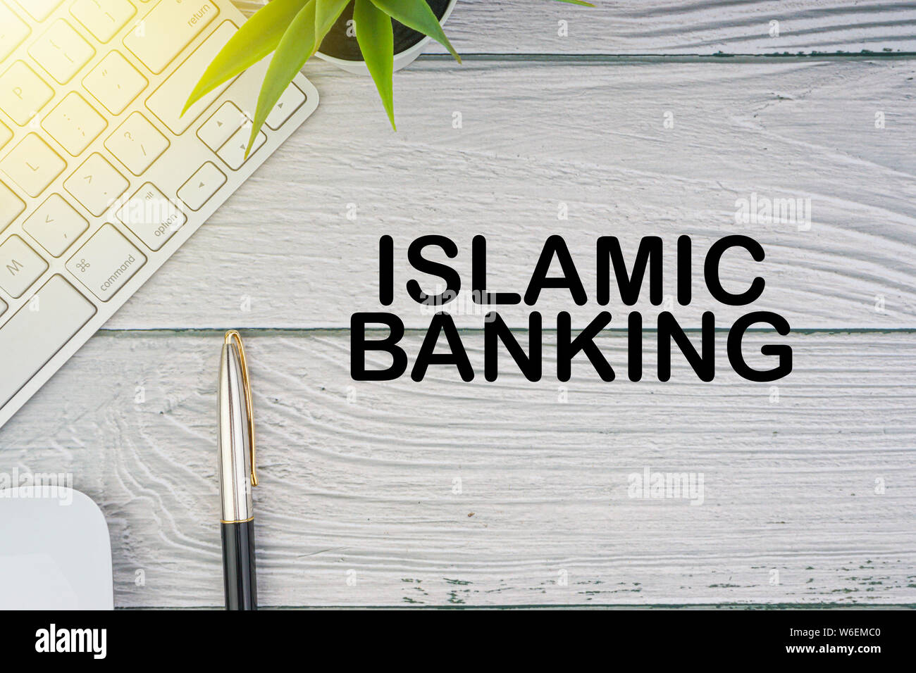 Flat lay, top view office table desk. Workspace with ISLAMIC BANKING ...