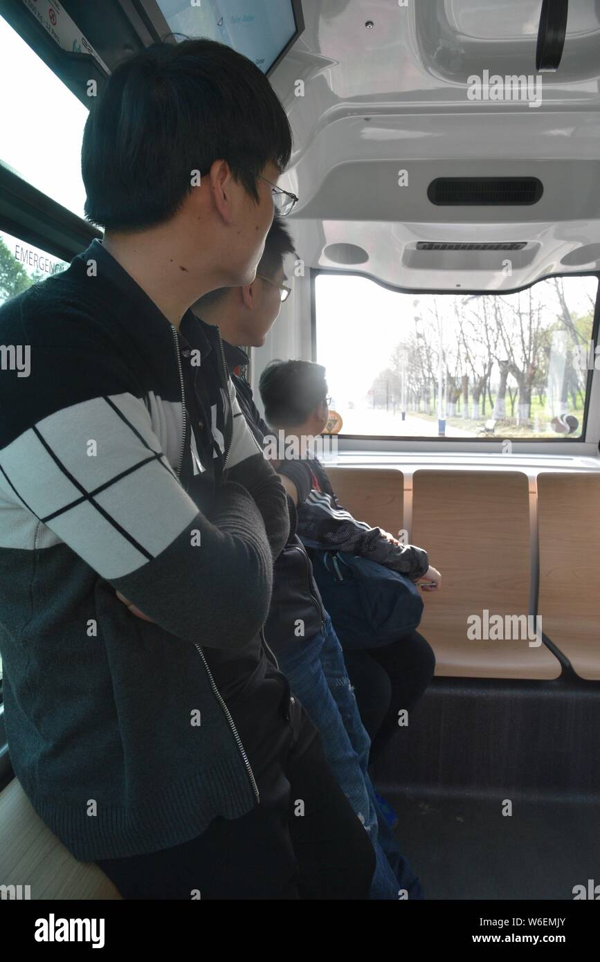 College students take China's first driverless mini bus based on ...