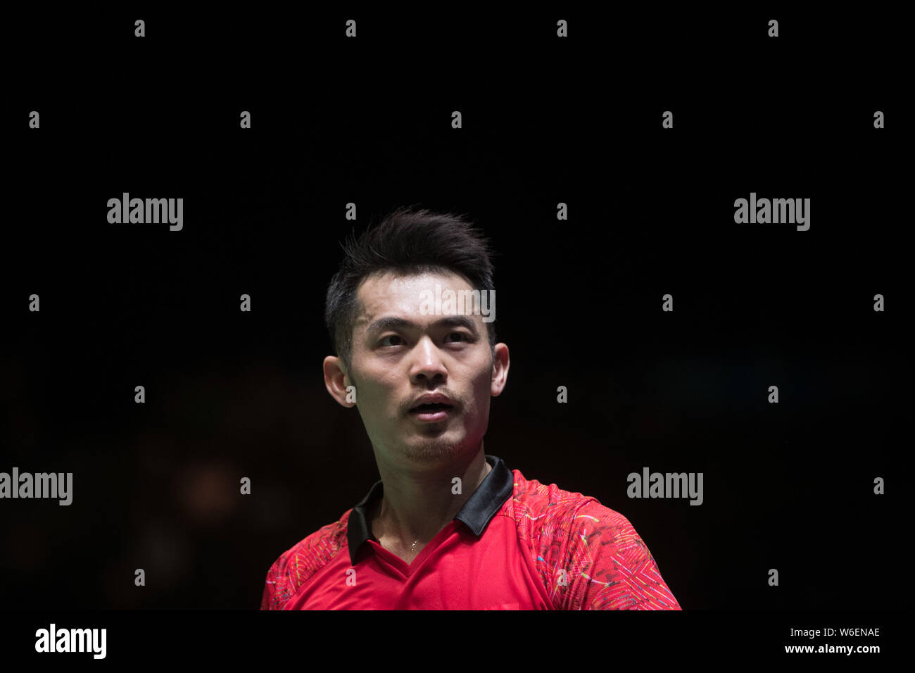 Lin Dan of China is pictured in the Round 1 match of the men's singles ...