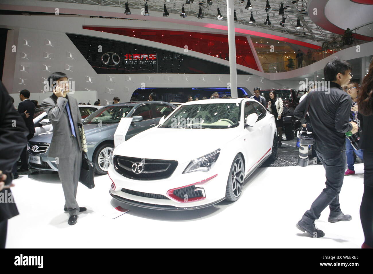 --FILE--People visit the stand of BAIC Group during the 13th Beijing ...