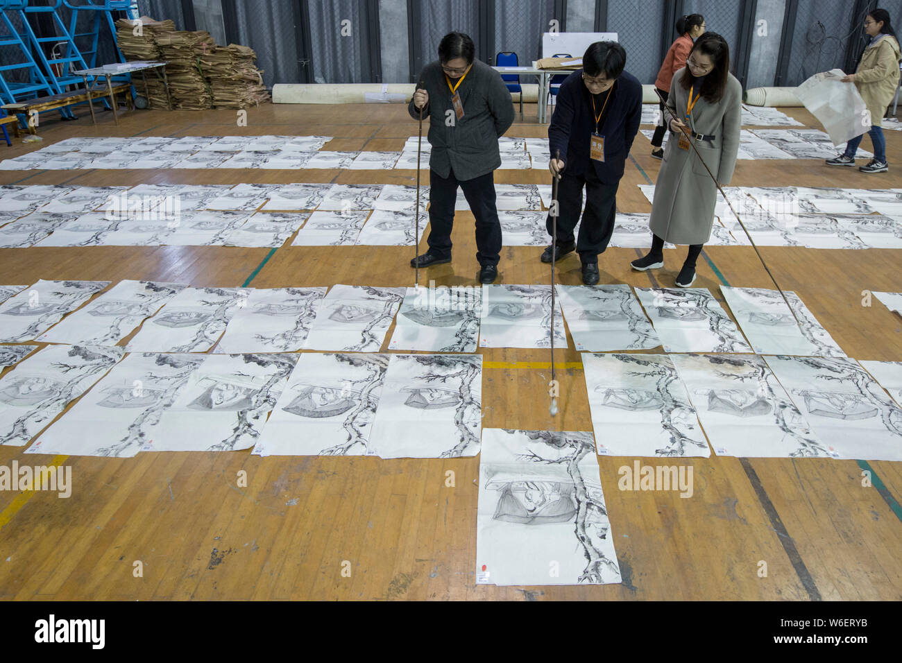 Teachers from China Academy of Art view the sketches completed by ...