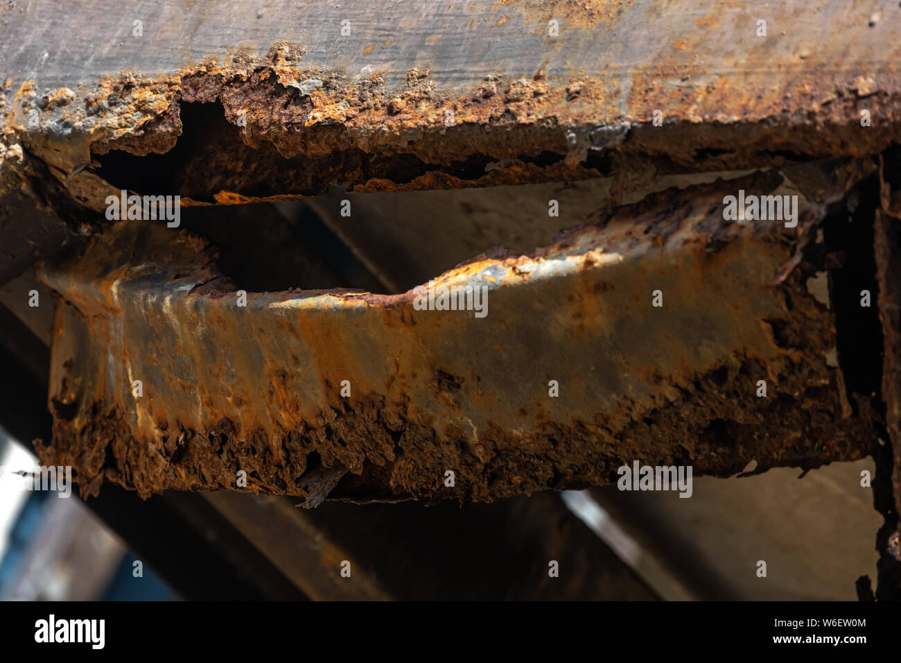Rust on steel structural columns & post floor support Stock Photo - Alamy