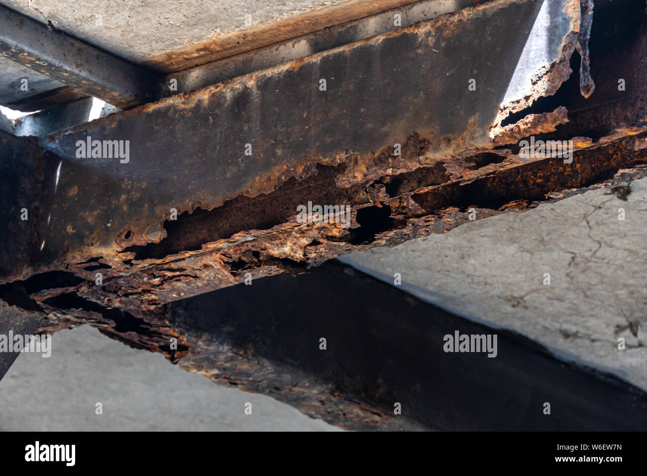 Rust on steel structural columns & post floor support Stock Photo - Alamy