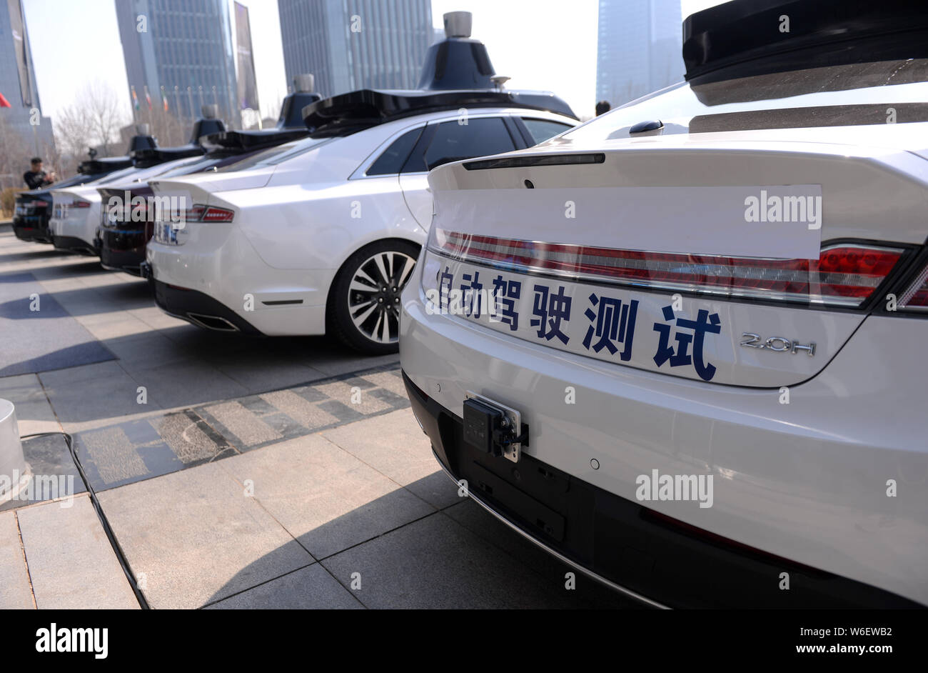 Self-driving cars of Baidu are lined up during a license issuing ...
