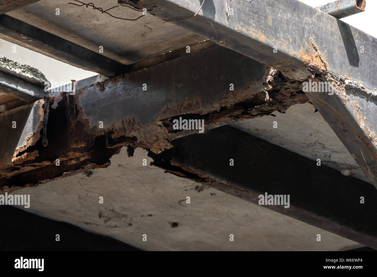 Rust on steel structural columns & post floor support Stock Photo - Alamy