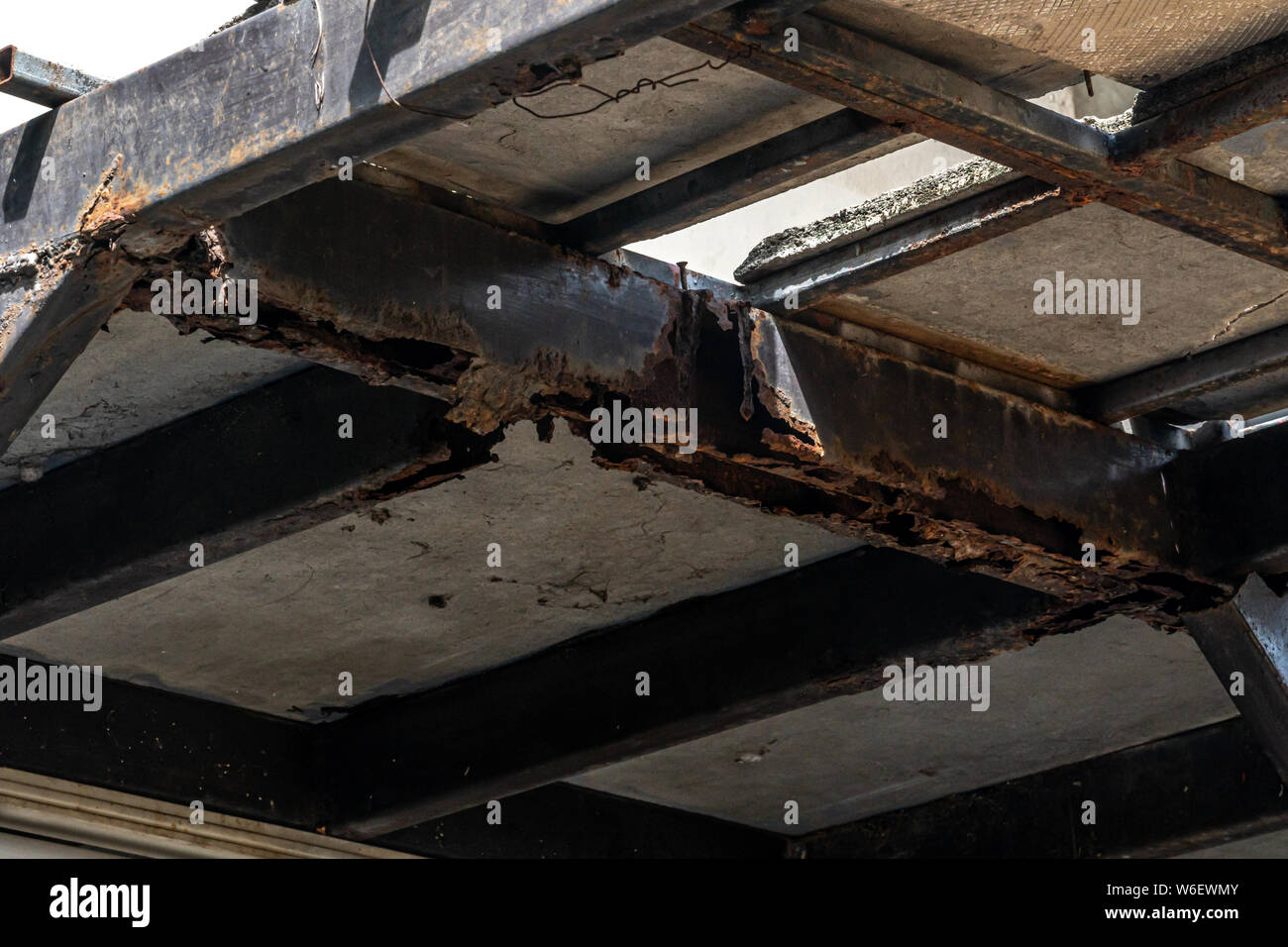 Rust on steel structural columns & post floor support Stock Photo - Alamy