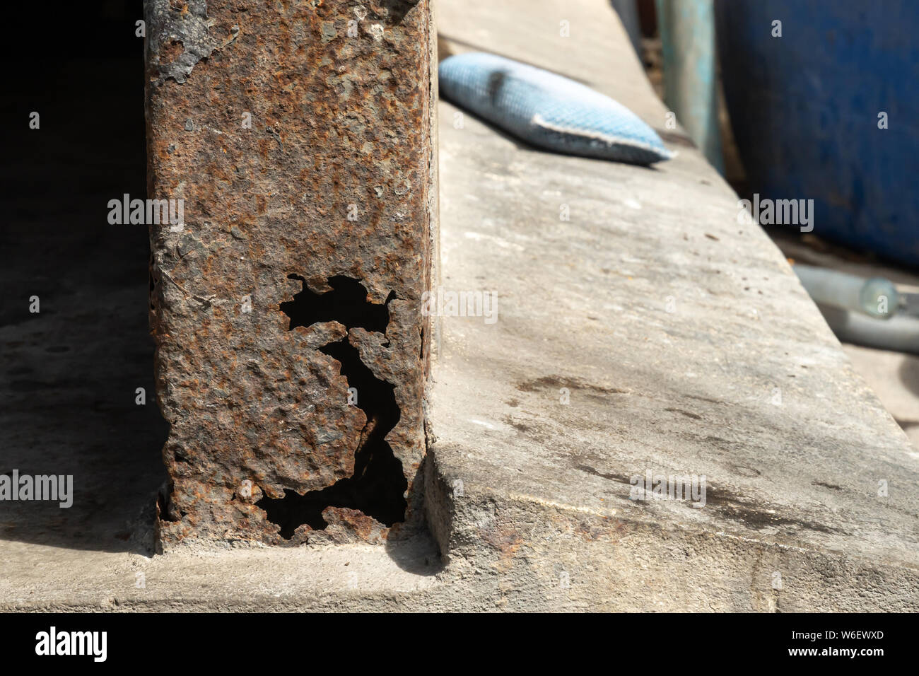 Rust on steel structural columns & post floor support Stock Photo - Alamy