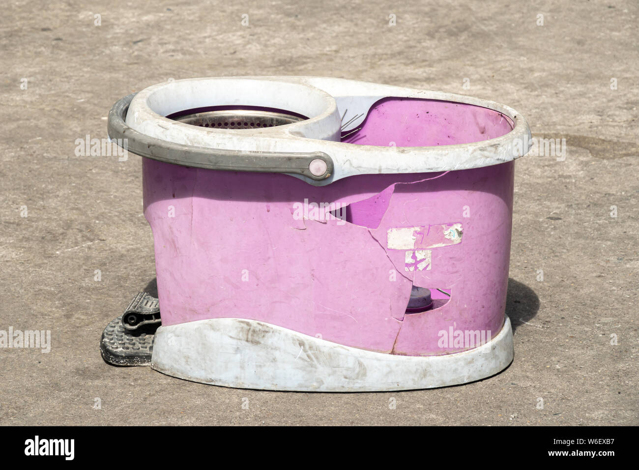 broken old plastic mop bucket Stock Photo - Alamy