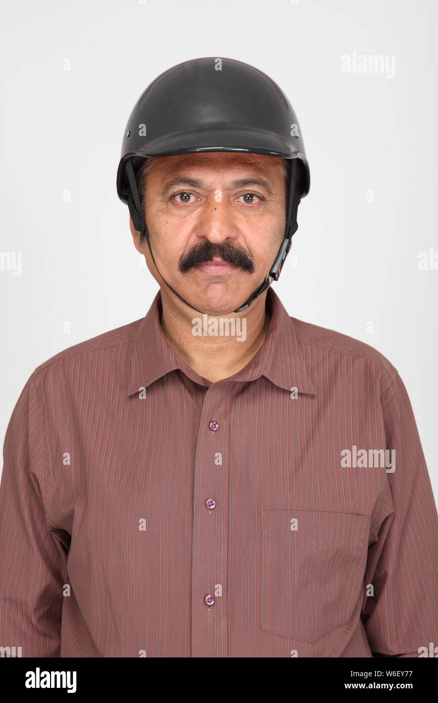 Man wearing crash helmet hi-res stock photography and images - Alamy