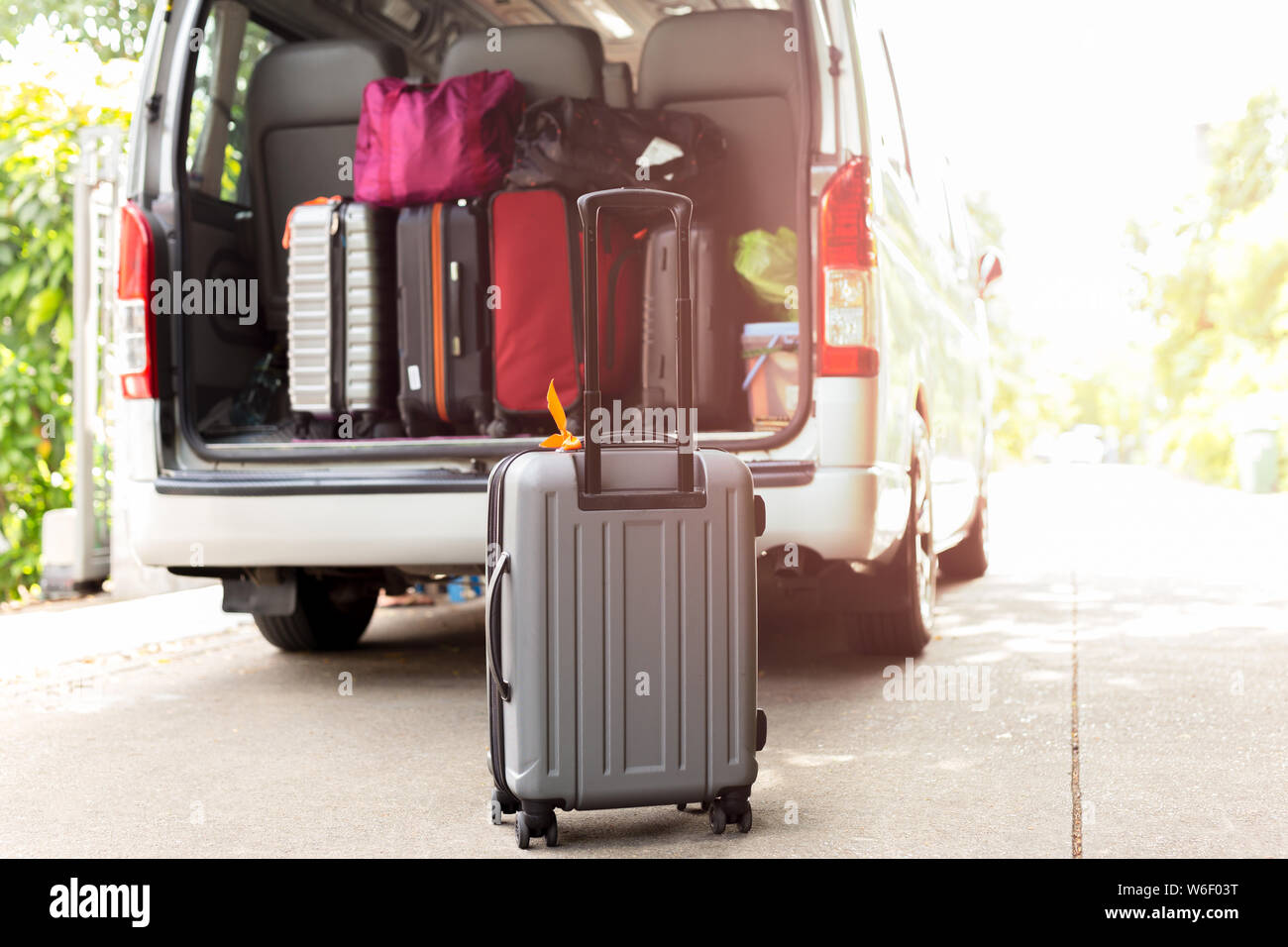Carry-on luggage bag in mini bus travel concept Stock Photo - Alamy