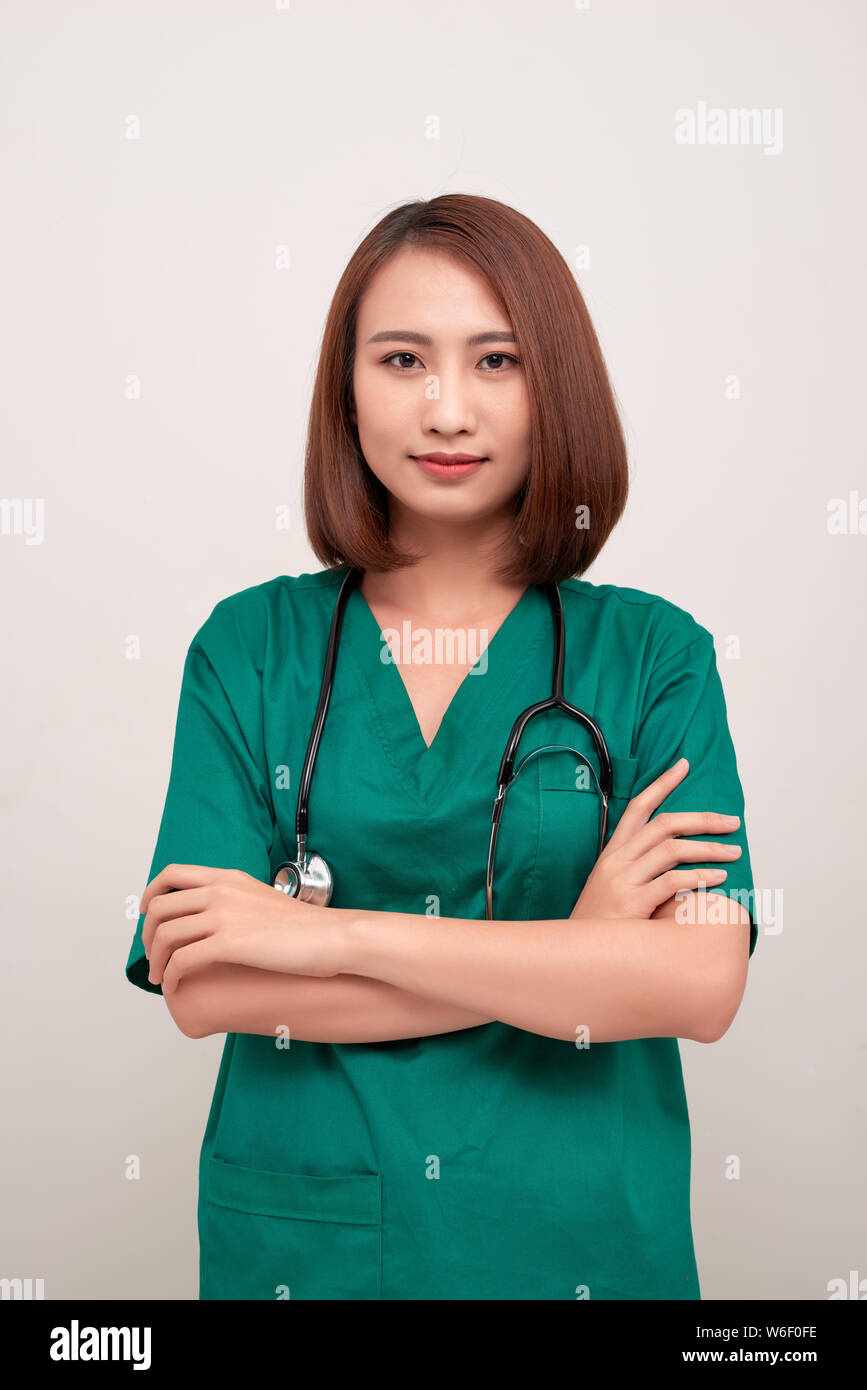 Portrait of an attractive young female nurse with stethoscope Stock ...