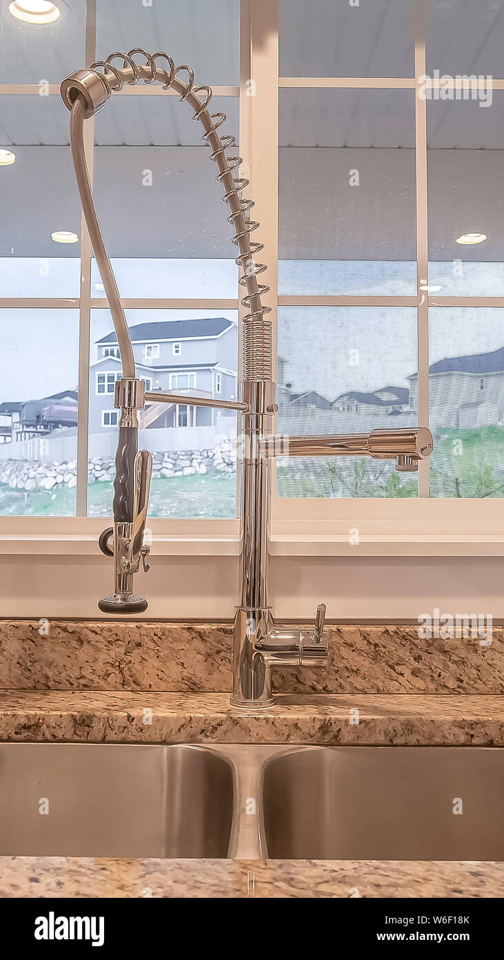 Vertical Stainless steel double basin sink and faucet inside the ...