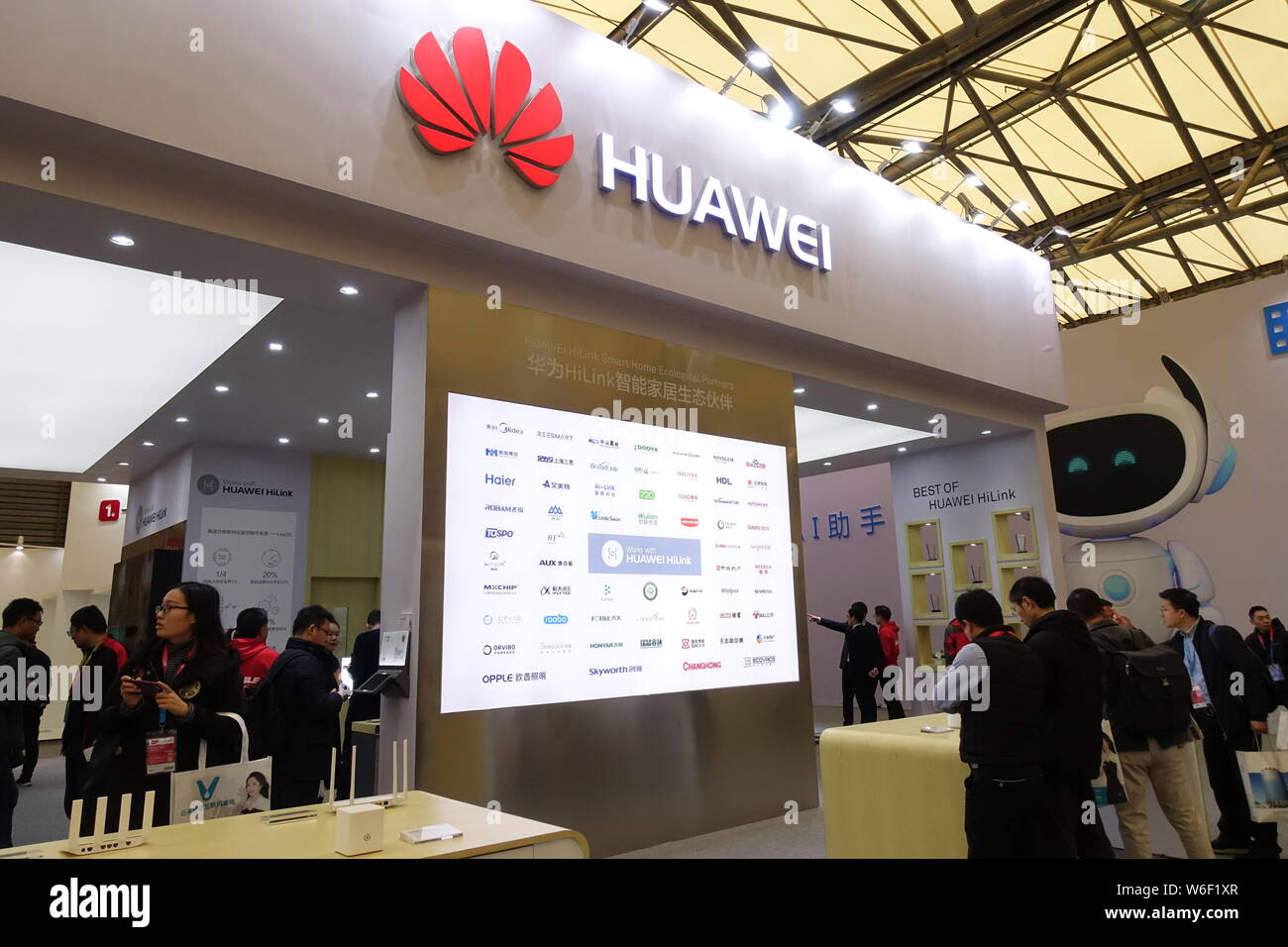 --FILE--People visit the stand of Huawei during an exhibition in ...